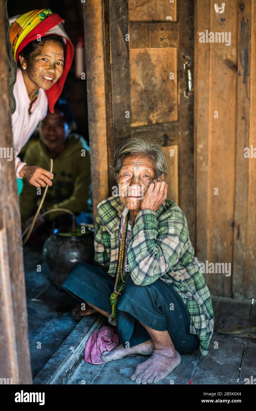 Local woman with tattooed face from village Mindat, Chin state, Myanmar ...