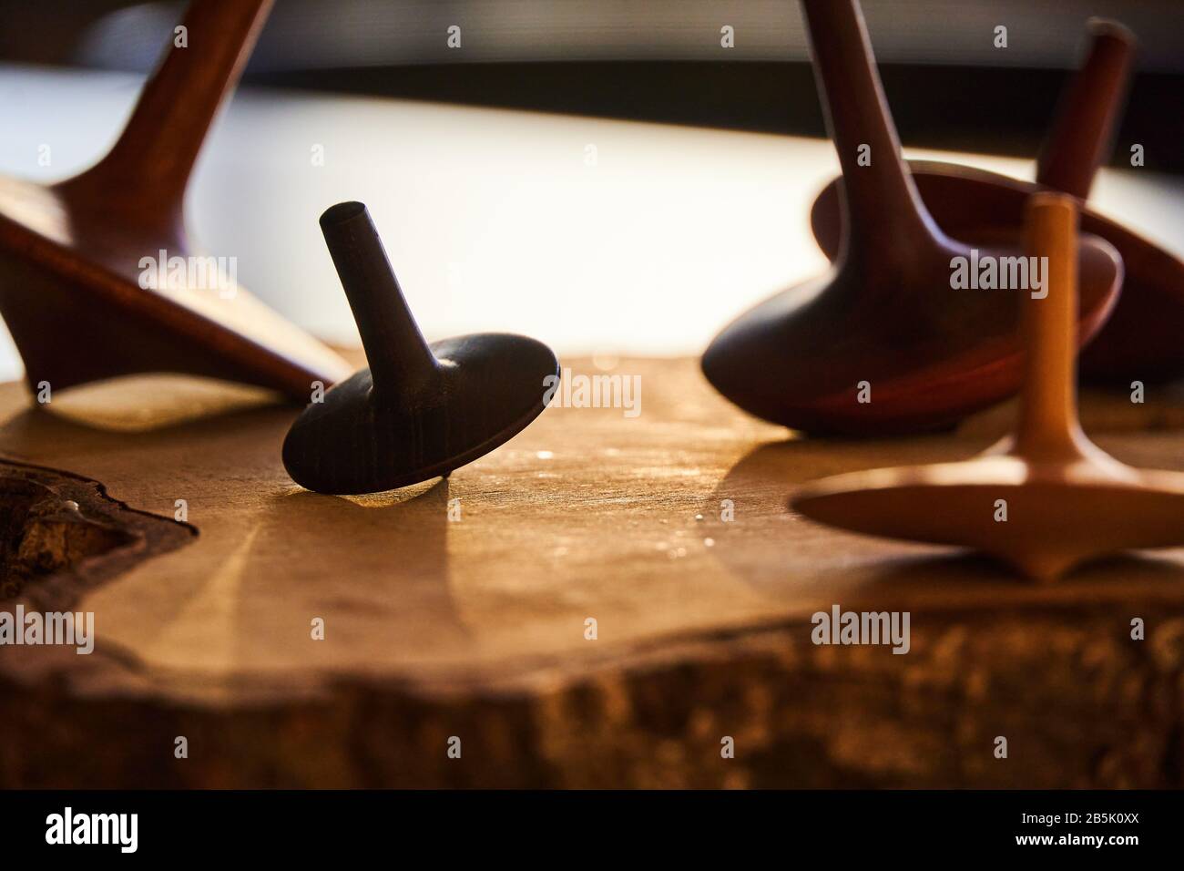 Small and large spinning tops hi-res stock photography and images - Alamy