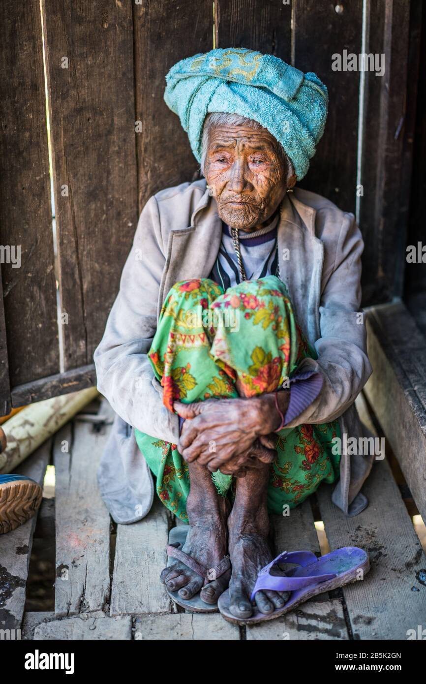 Local woman with tattooed face from village Mindat, Chin state, Myanmar ...