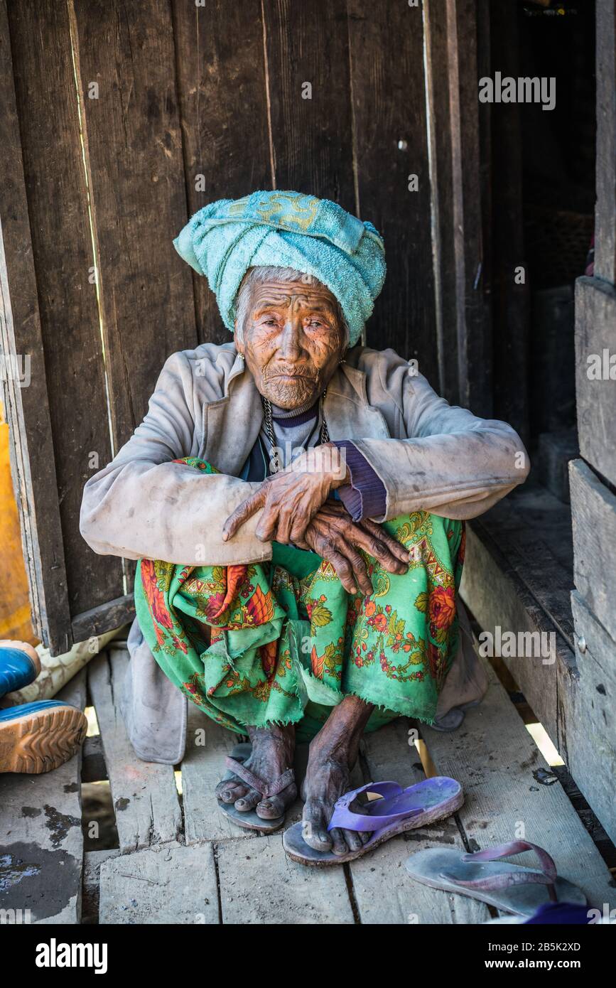 Local woman with tattooed face from village Mindat, Chin state, Myanmar ...