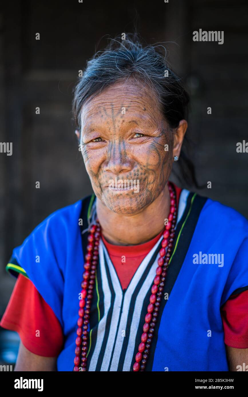 Local woman with tattooed face from village Mindat, Chin state, Myanmar ...