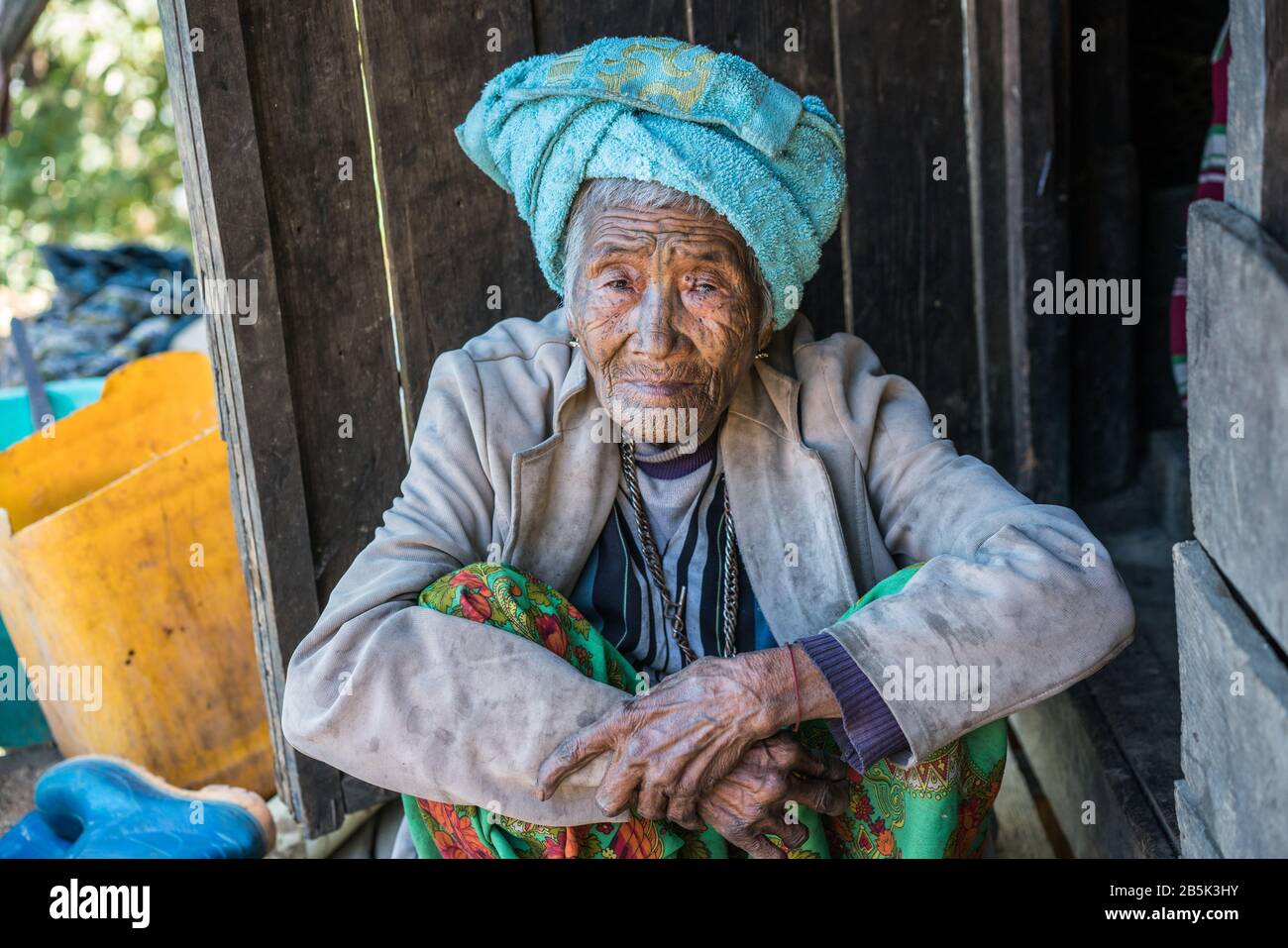 Local woman with tattooed face from village Mindat, Chin state, Myanmar ...