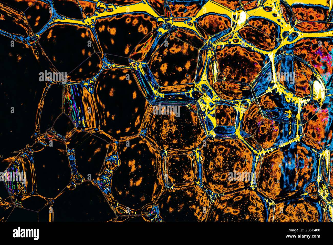 Oil bubbles inside water base form patterns Stock Photo - Alamy