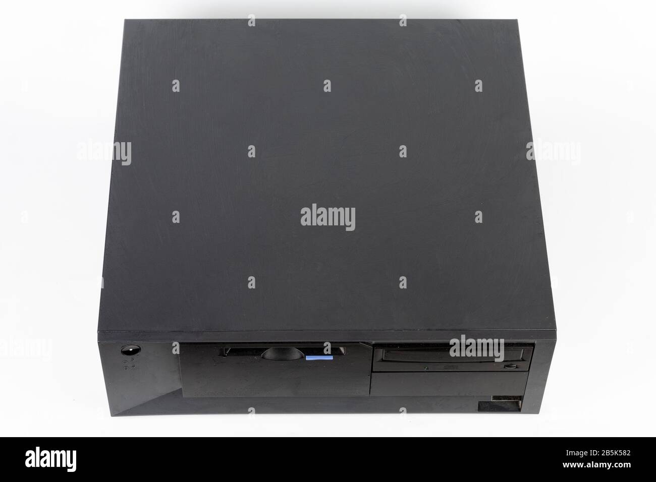 The old desktop computer, PC with floppy disk drive and cd drive on ...