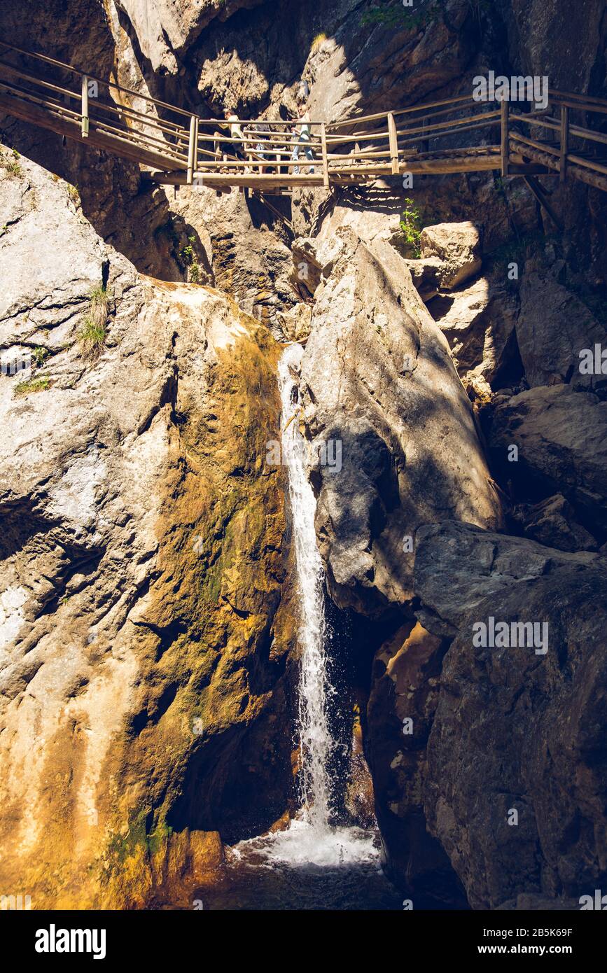 View at waterfall path along mountain stream. Tourist spot. Travel ...