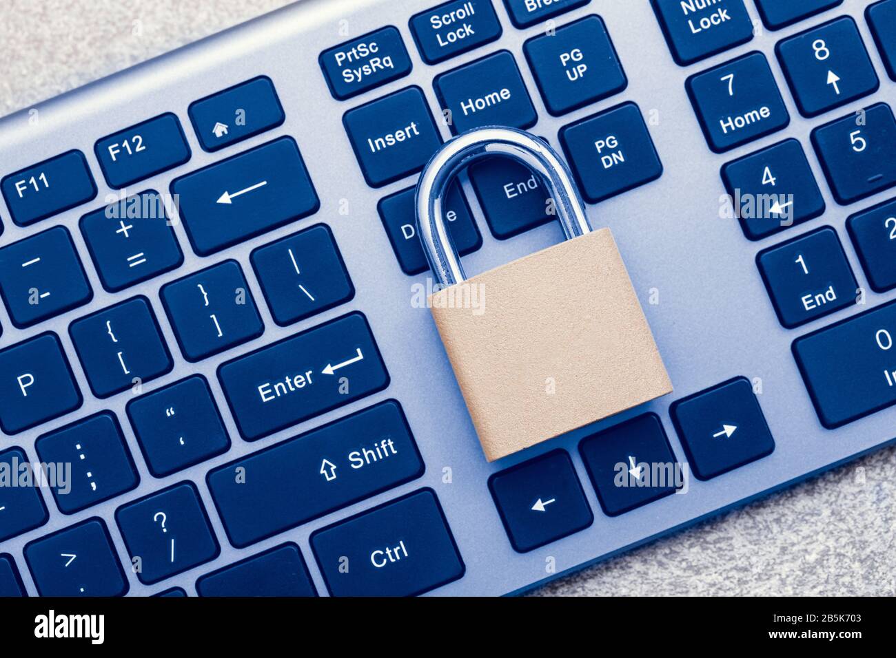 Closed lock on keyboard Stock Photo - Alamy