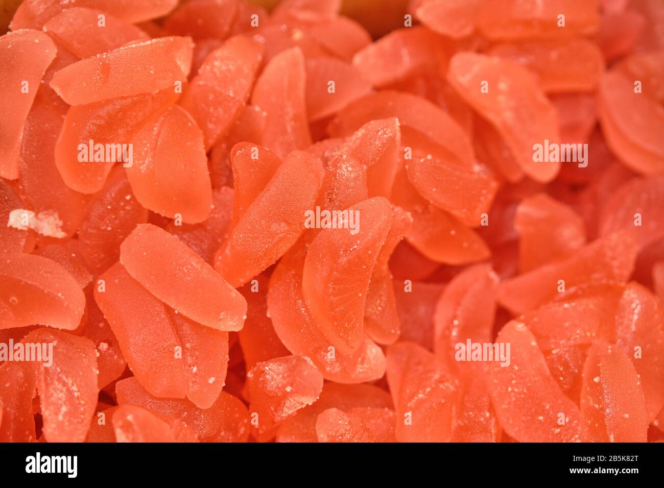 Background and texture of red marmalade sweets. Close up Stock Photo ...
