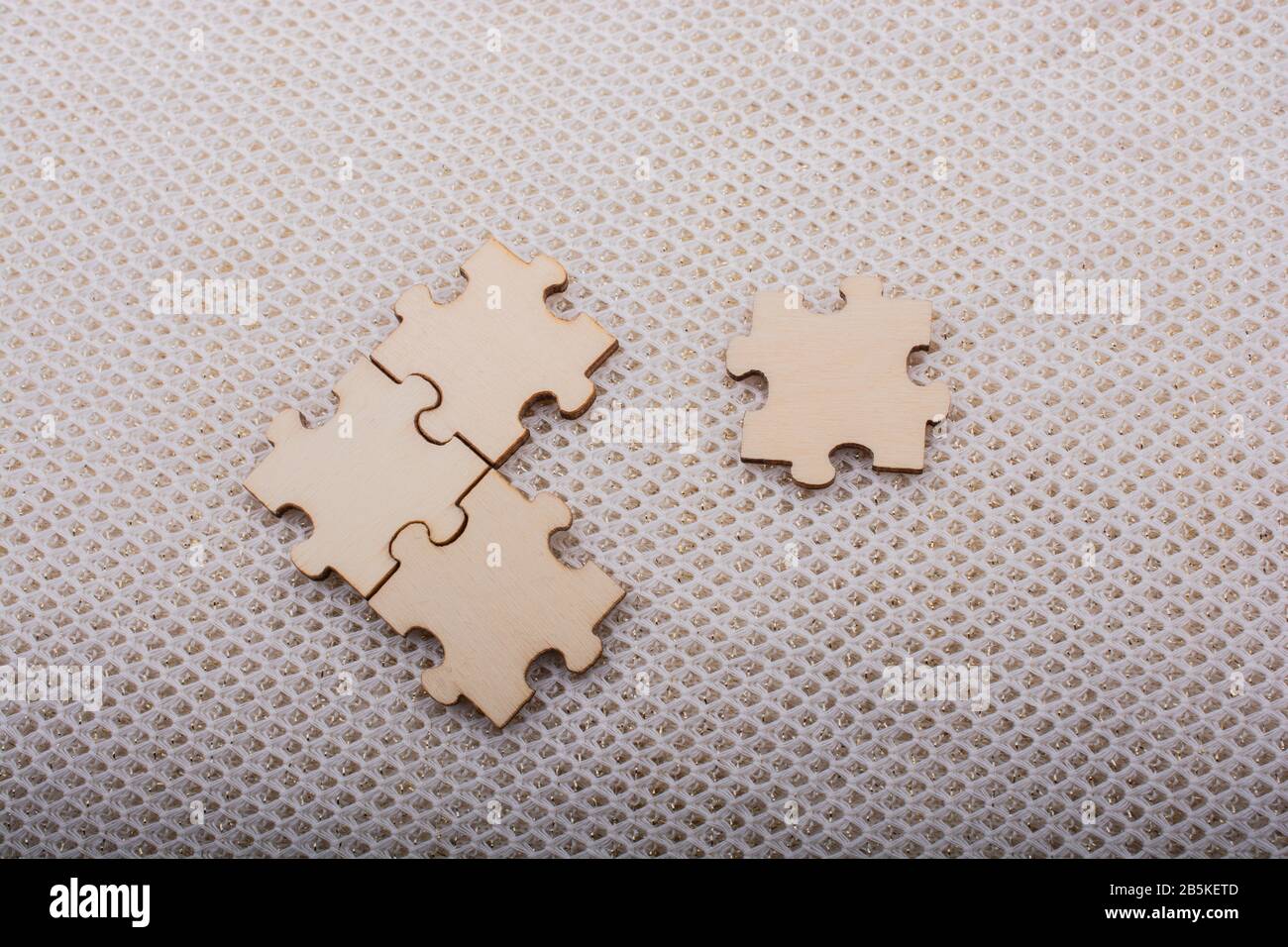 Pieces of jigsaw puzzle as problem solution concept on white background ...