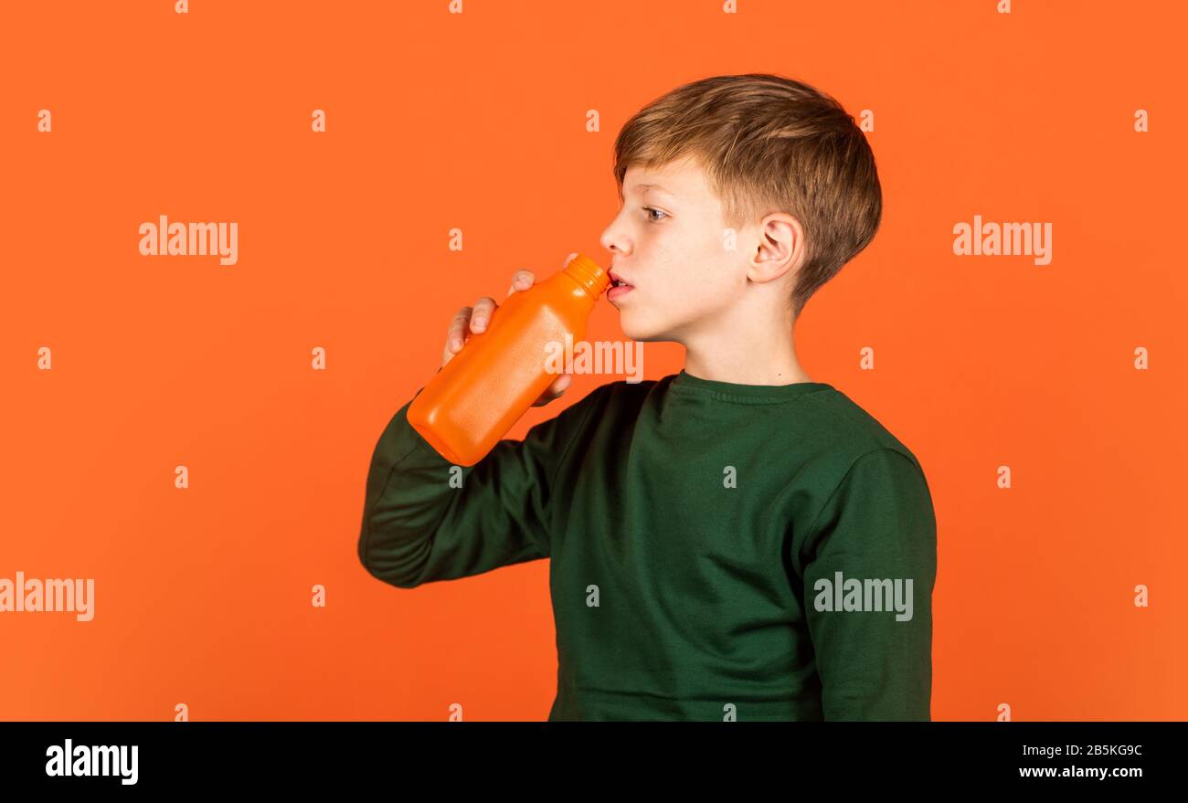 Refreshing beverage concept. Water balance. Small child drink juice ...