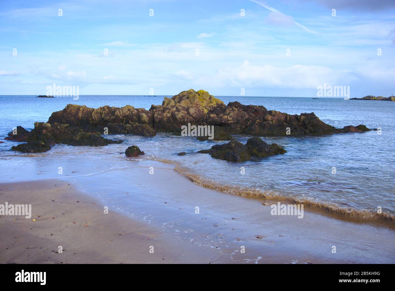View across rock formation to the North Sea from the beach in Eyemouth ...