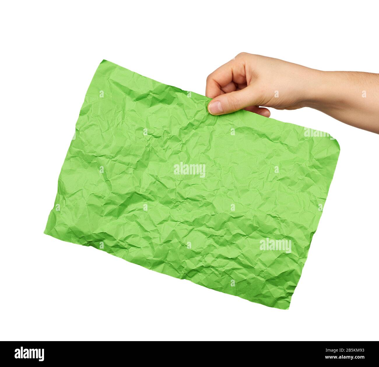 female hand hold empty crumpled green rectangular sheet of paper a4 ...