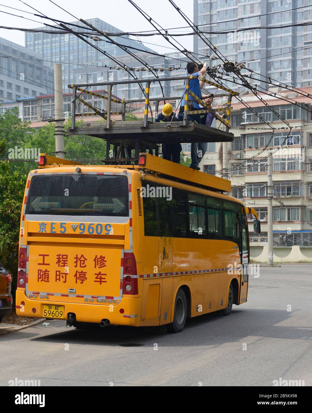 Repairing trolleybus powerline installations at a trolleybus depot in ...