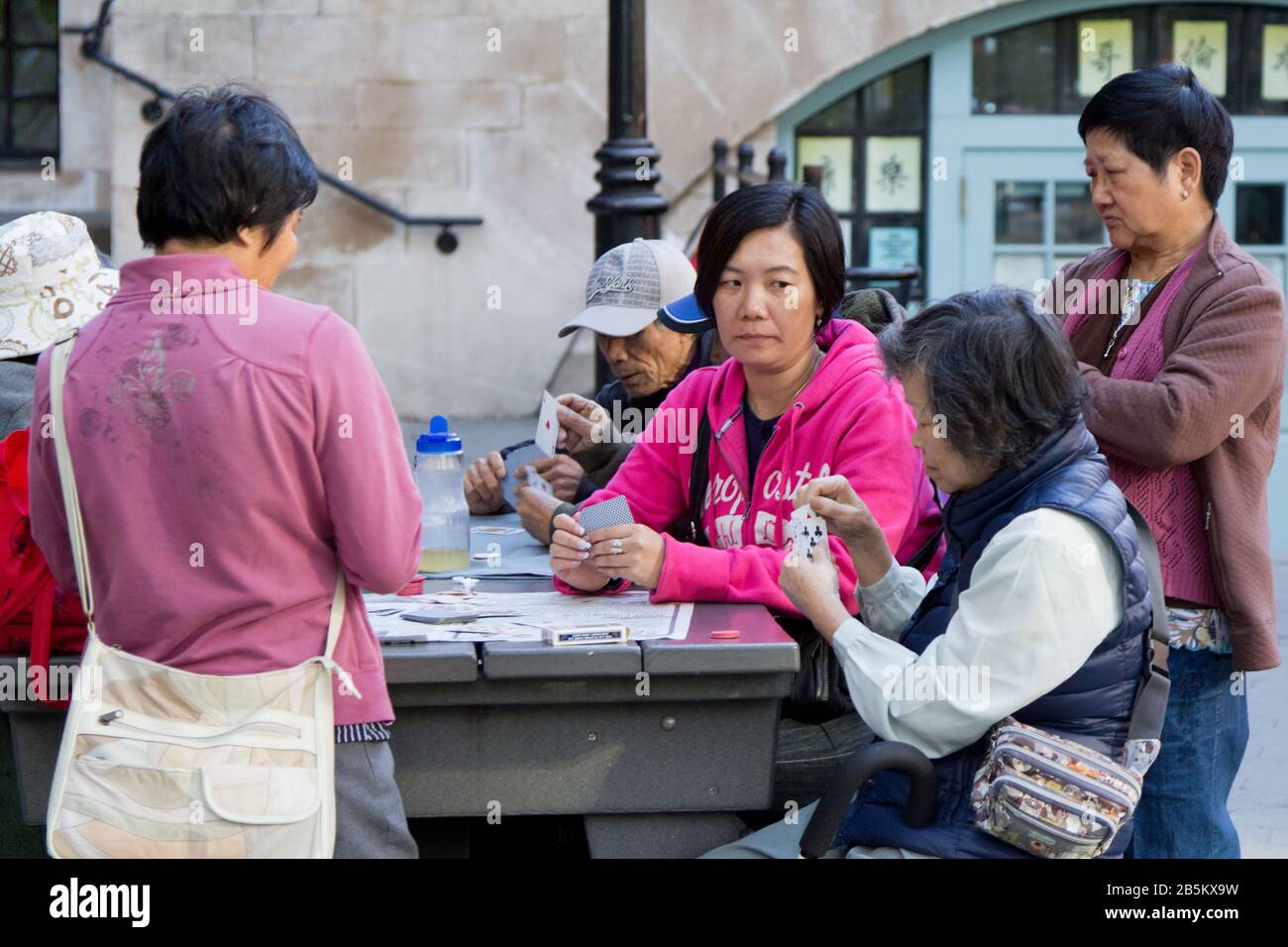 Group Elderly Women Playing Table Stock Photos & Group Elderly Women ...