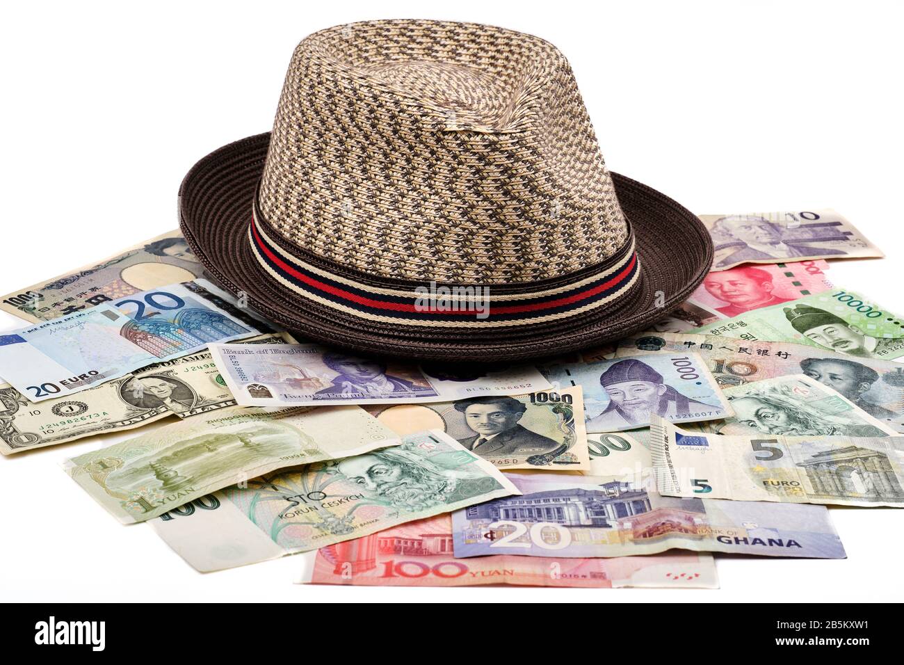 Travel around the world concept with straw hat and mixture of western ...