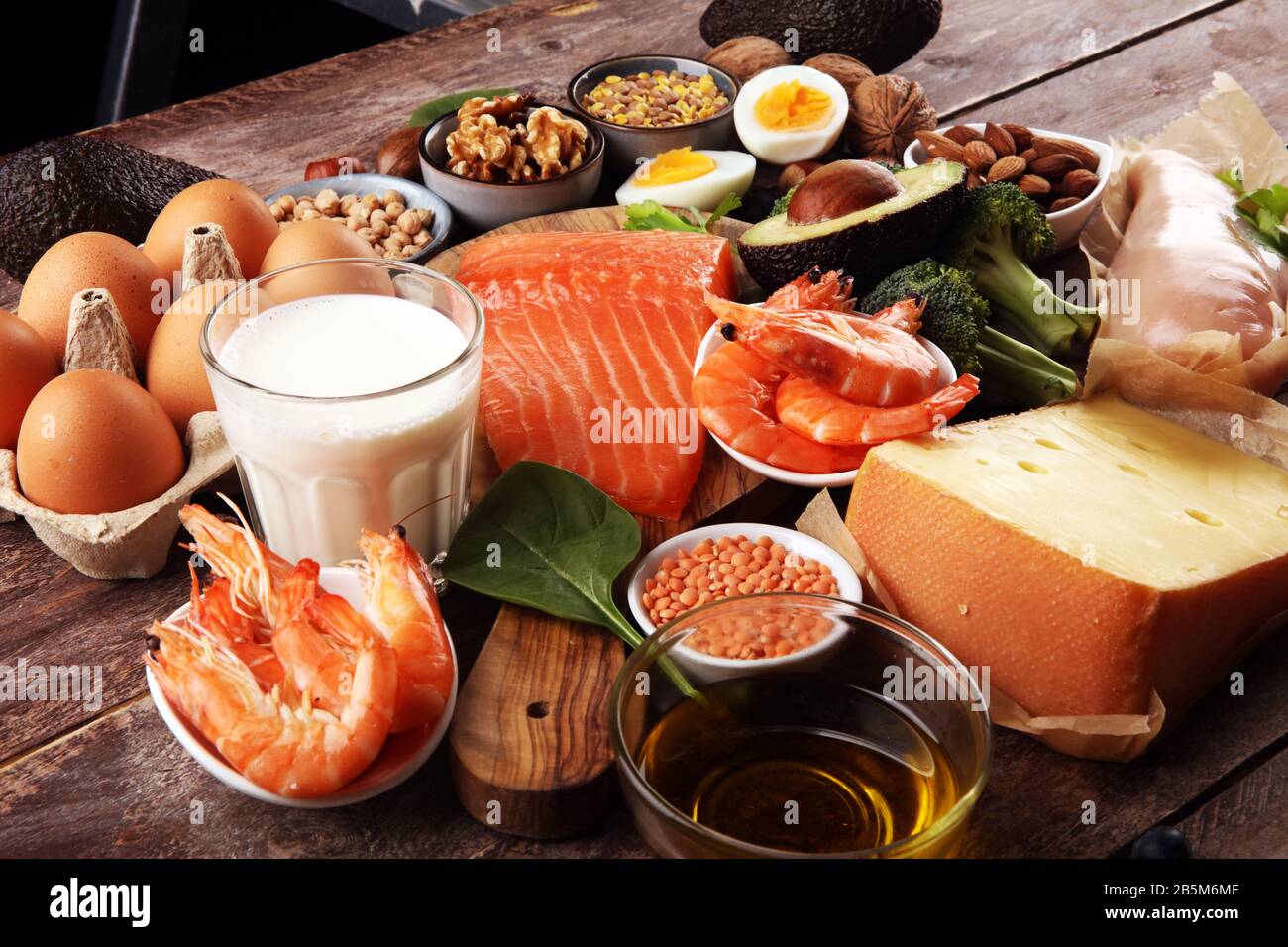 healthy eating and diet concept - natural rich in protein food on table ...
