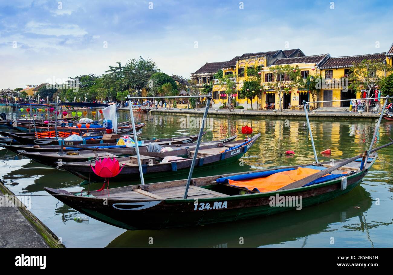 Tourist river boats moored on the The Bon river in Hot An, Vietnam ...