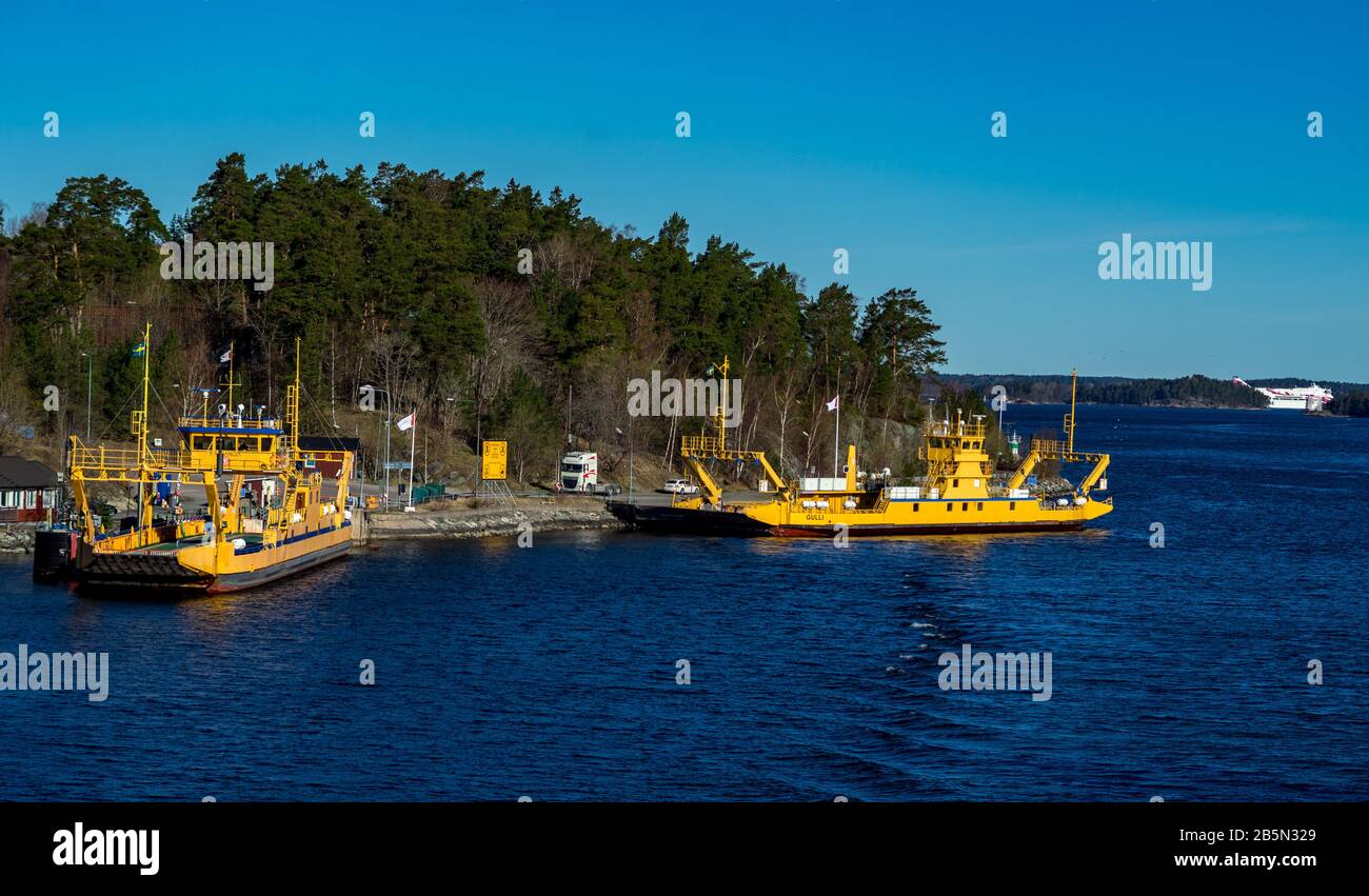 Yellow ferrya for transporting cars and people from the islands of the ...