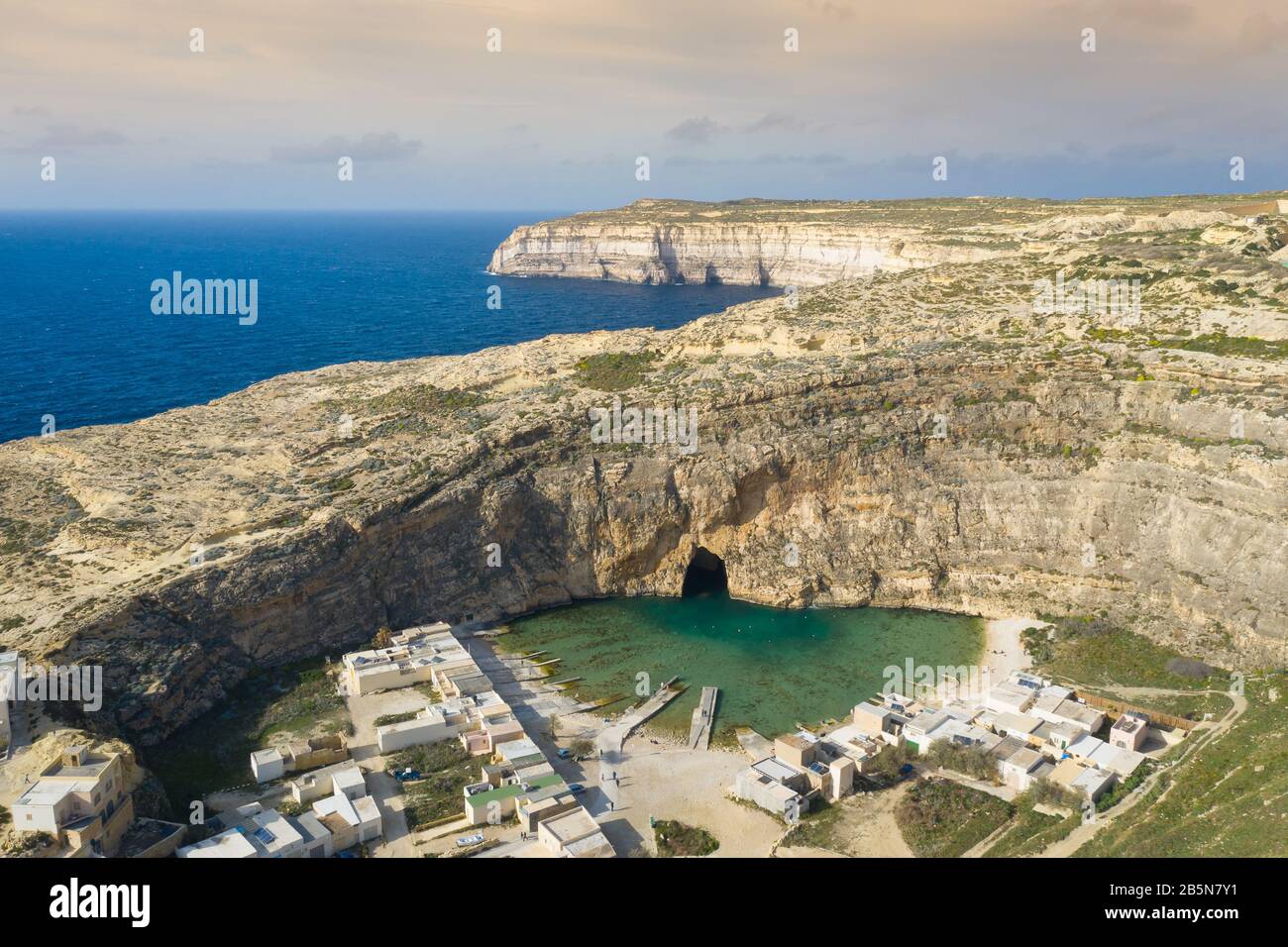Dwejra is a lagoon of seawater on the island of Gozo. Aerial view of ...