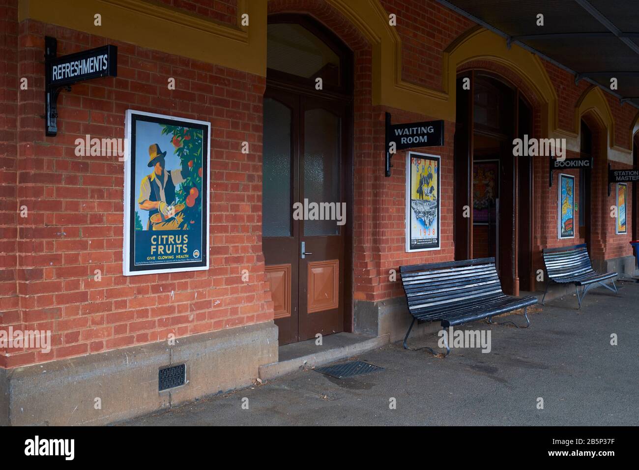 The platform waiting area at the old, restored, red brick train station ...
