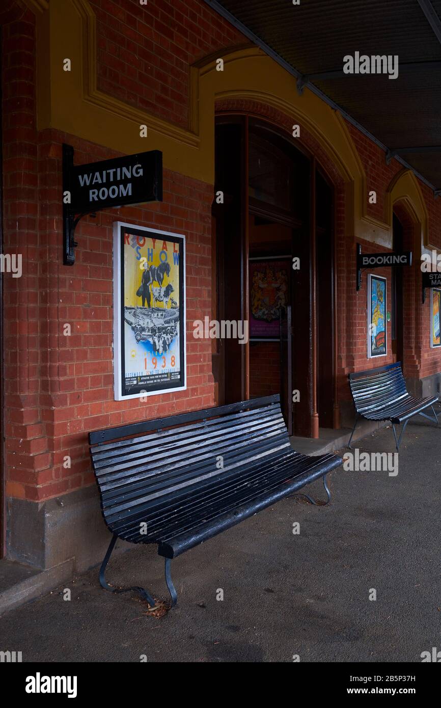 The platform waiting area at the old, restored, red brick train station ...