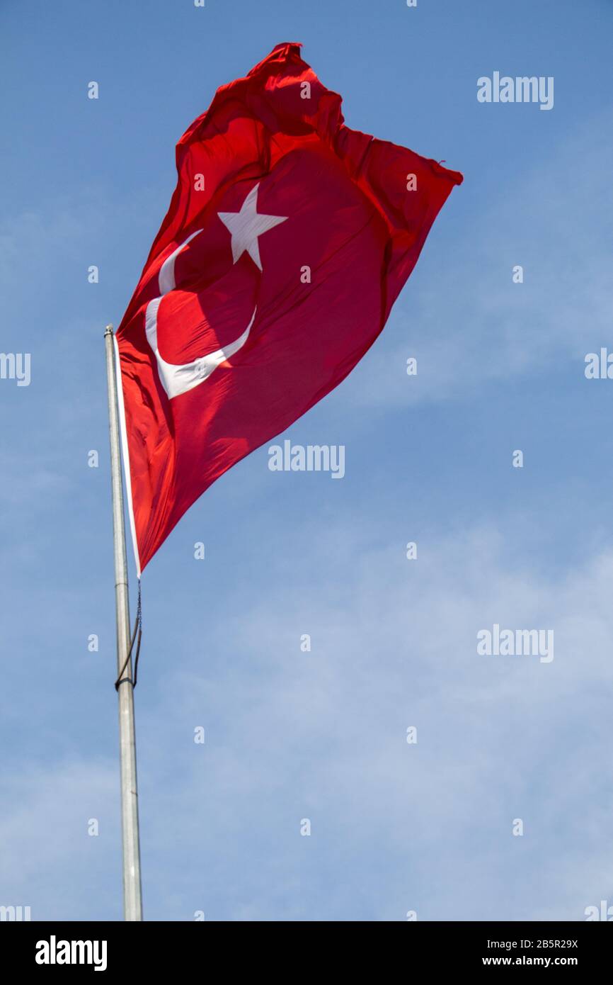 Turkish national flag hang on a pole in open air Stock Photo - Alamy
