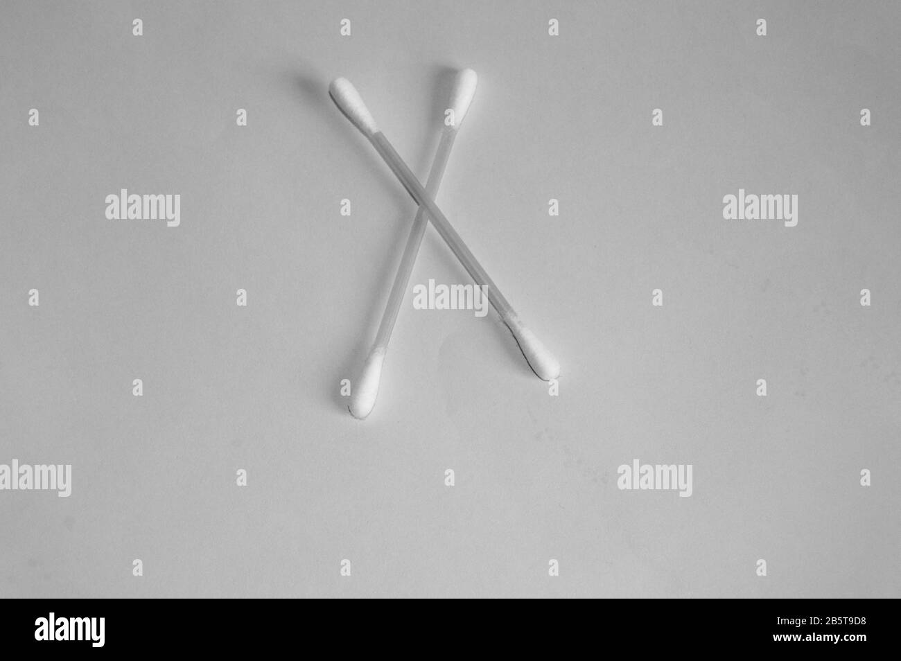 White cotton swab on a black background Black and White Stock Photos ...