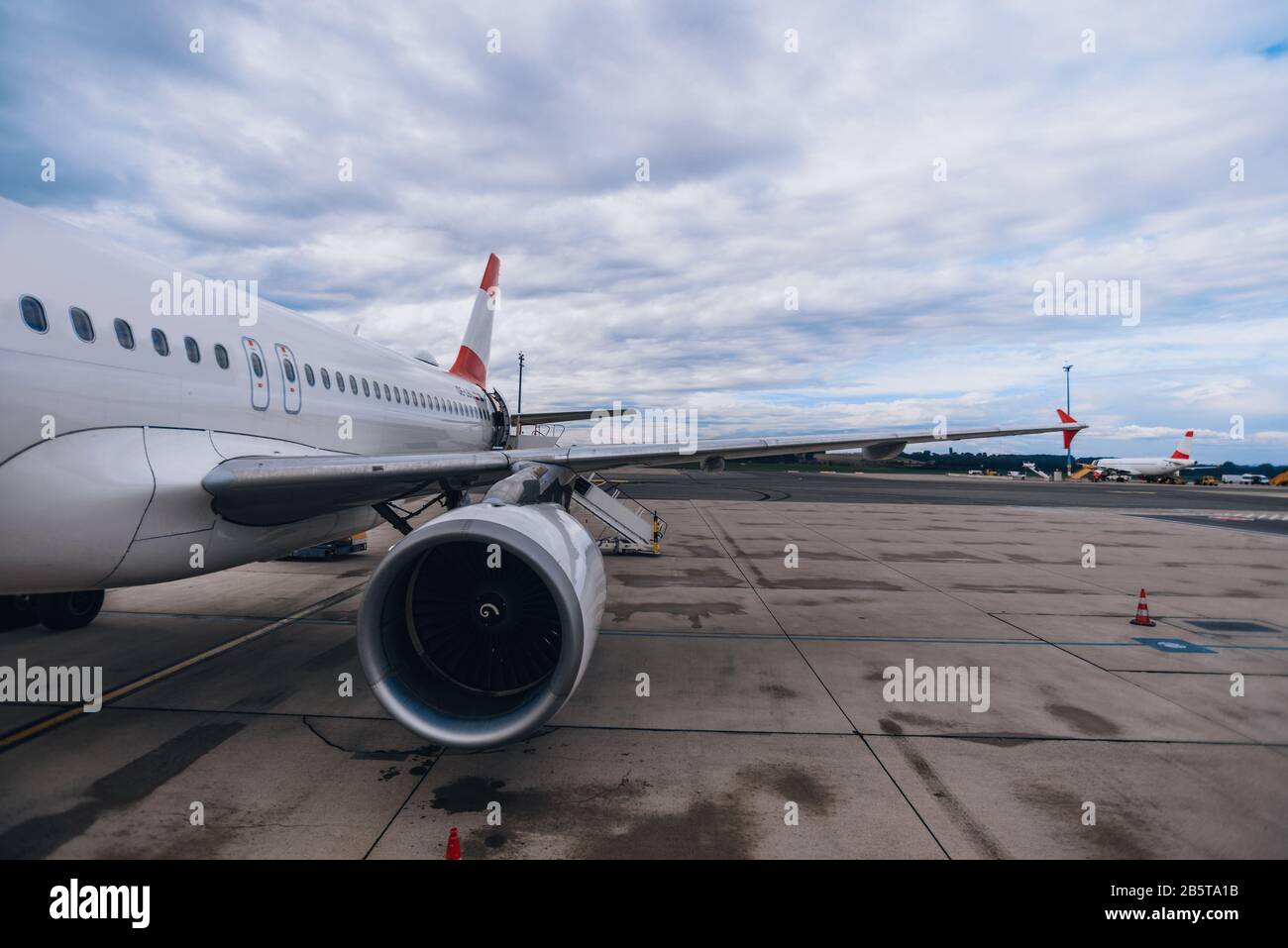 Jet propelled airplane during a boarding process at an aerodrome Stock ...