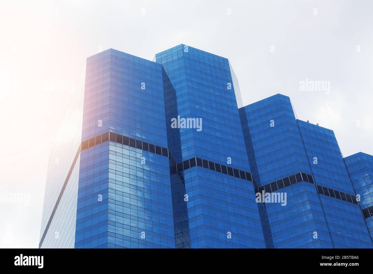 Building with sunlight at the sky Stock Photo - Alamy