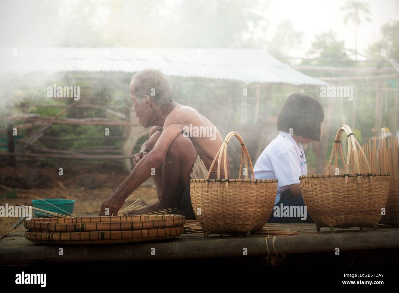 Old men and girls in rural of Thailand Stock Photo - Alamy