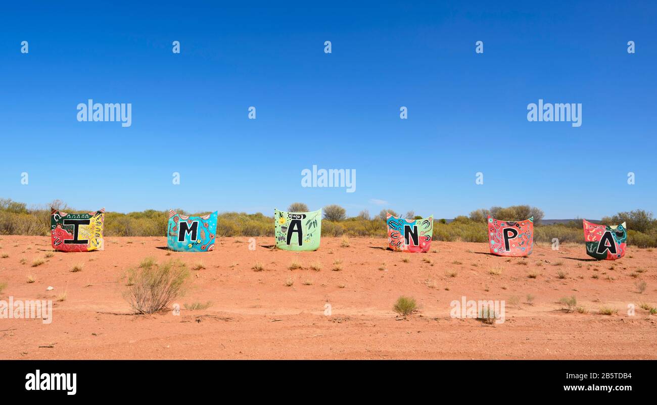 Artistic name sign for the small Outback town of Imanpa, Northern ...