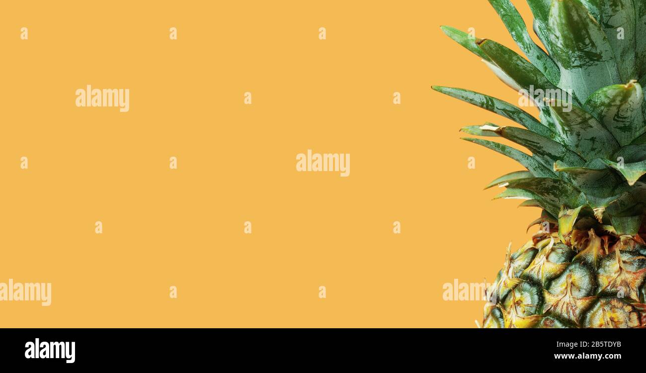 Pineapple with color of yellow background Stock Photo - Alamy