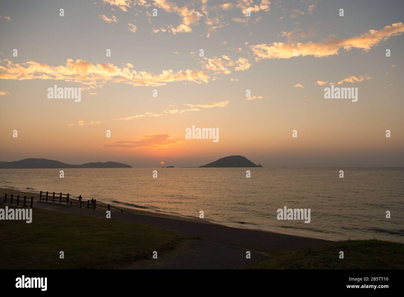 Japan sunset sea and sandy beach Stock Photo - Alamy