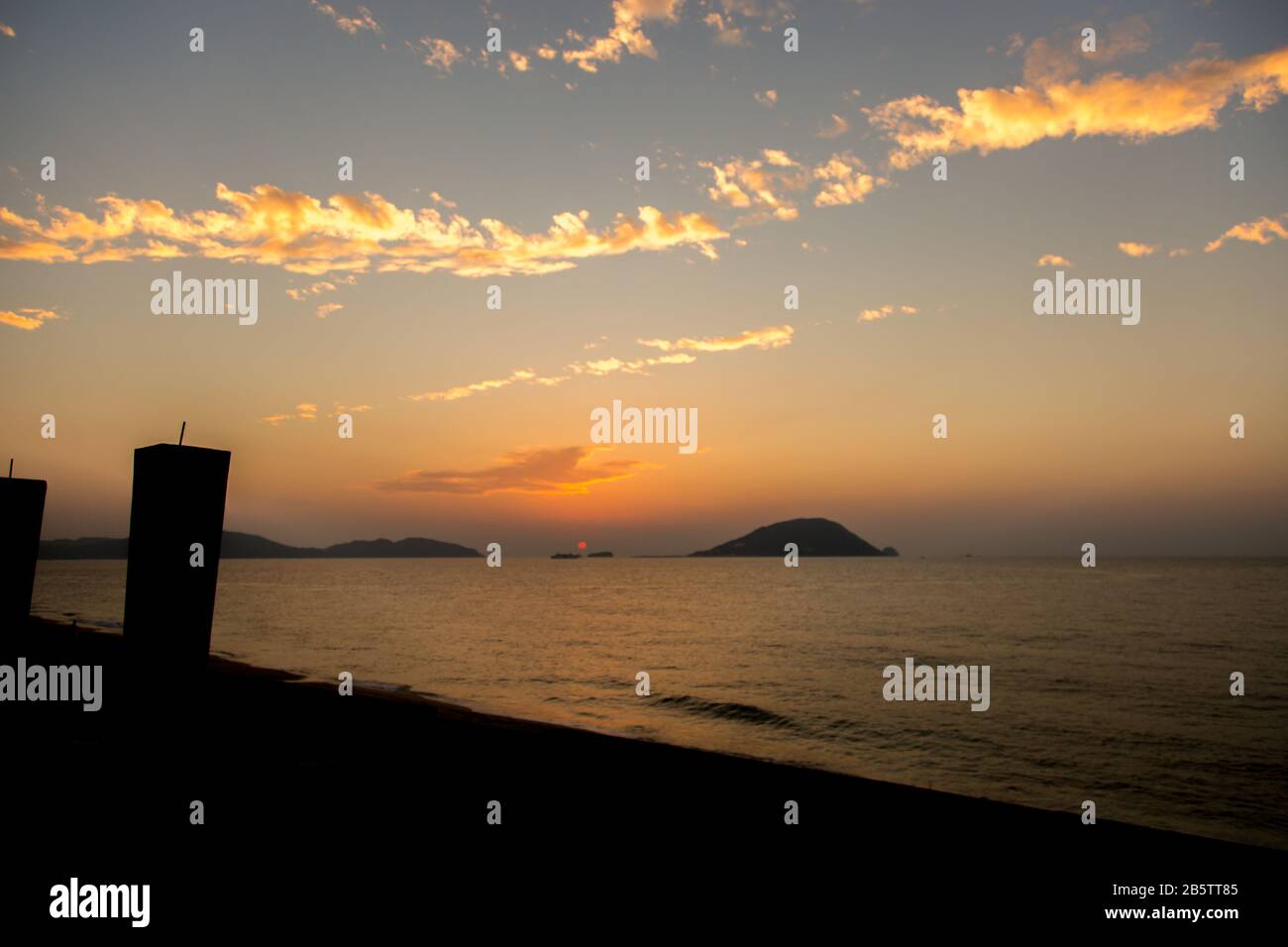 Japan sunset sea and sandy beach Stock Photo - Alamy