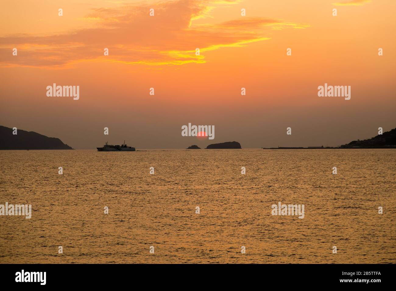 Japan sunset sea and sandy beach Stock Photo - Alamy