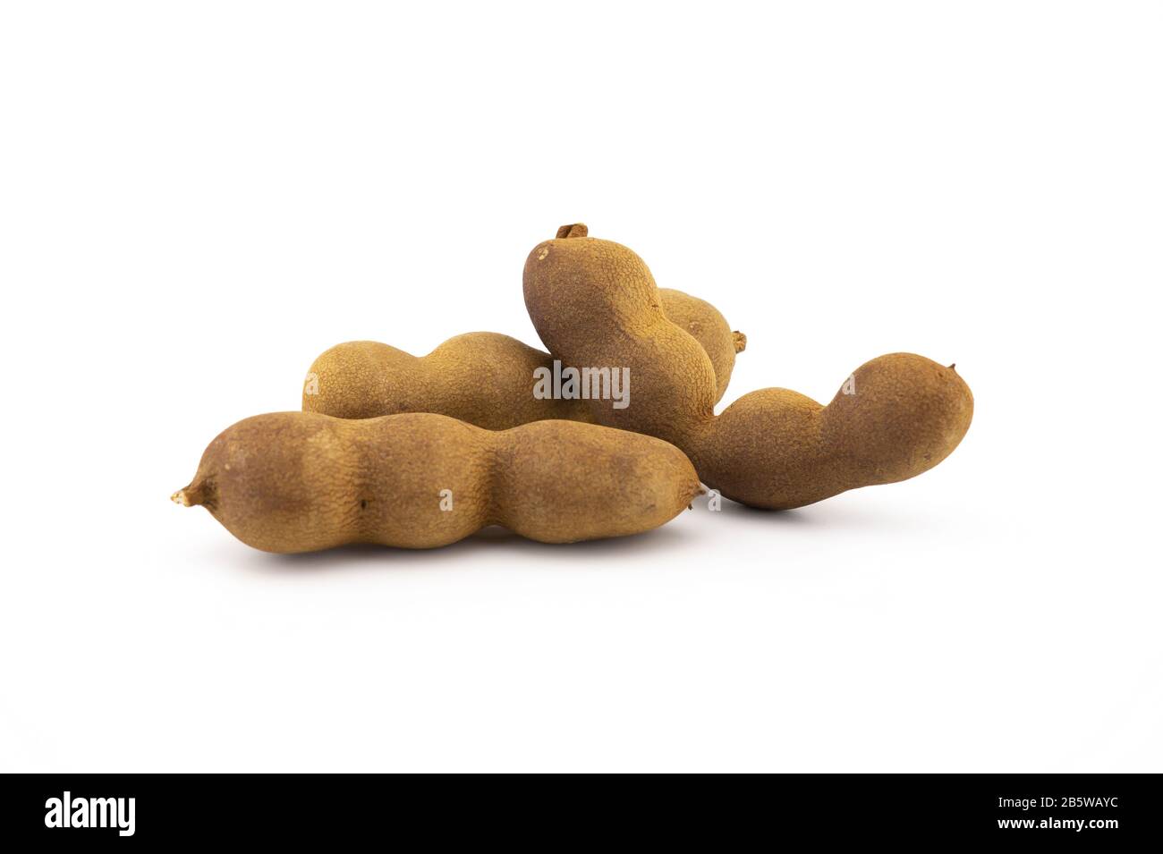 Sweet whole tamarind fruits isolated on white background Stock Photo ...