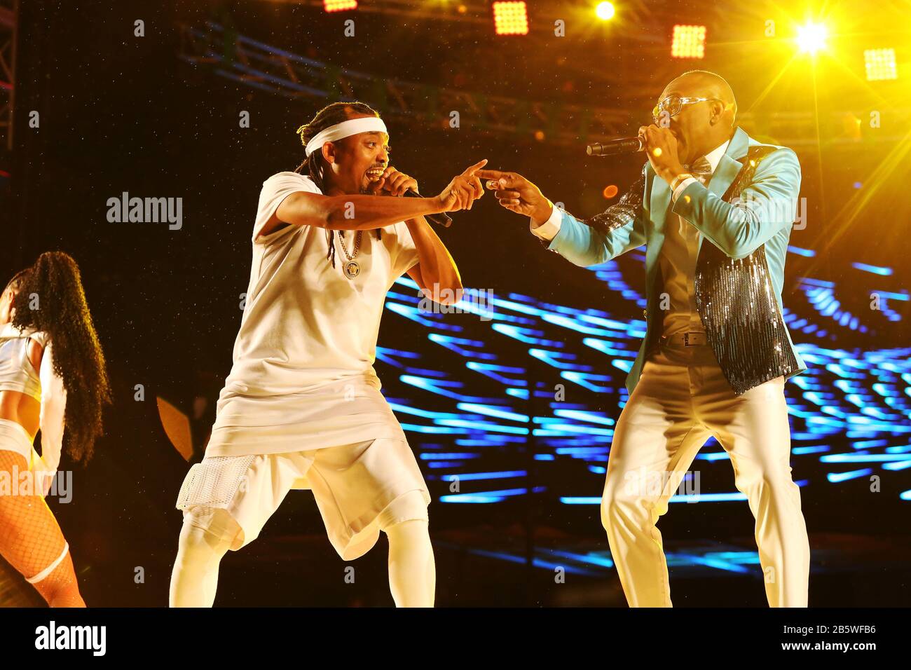 PORT OF SPAIN, TRINIDAD - FEB 17: Machel Montano (L) performs with a ...