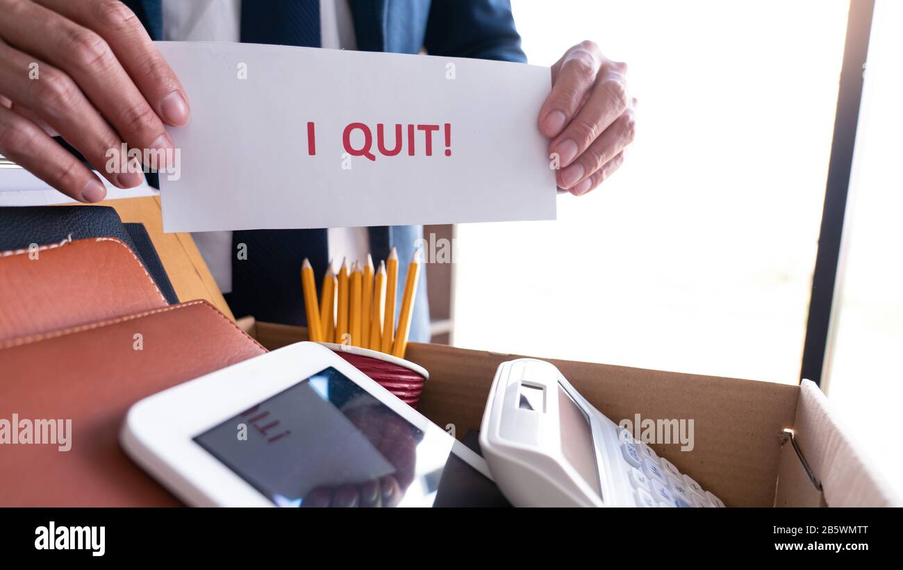 Businessman holding with I quit words card letter, resign employee ...