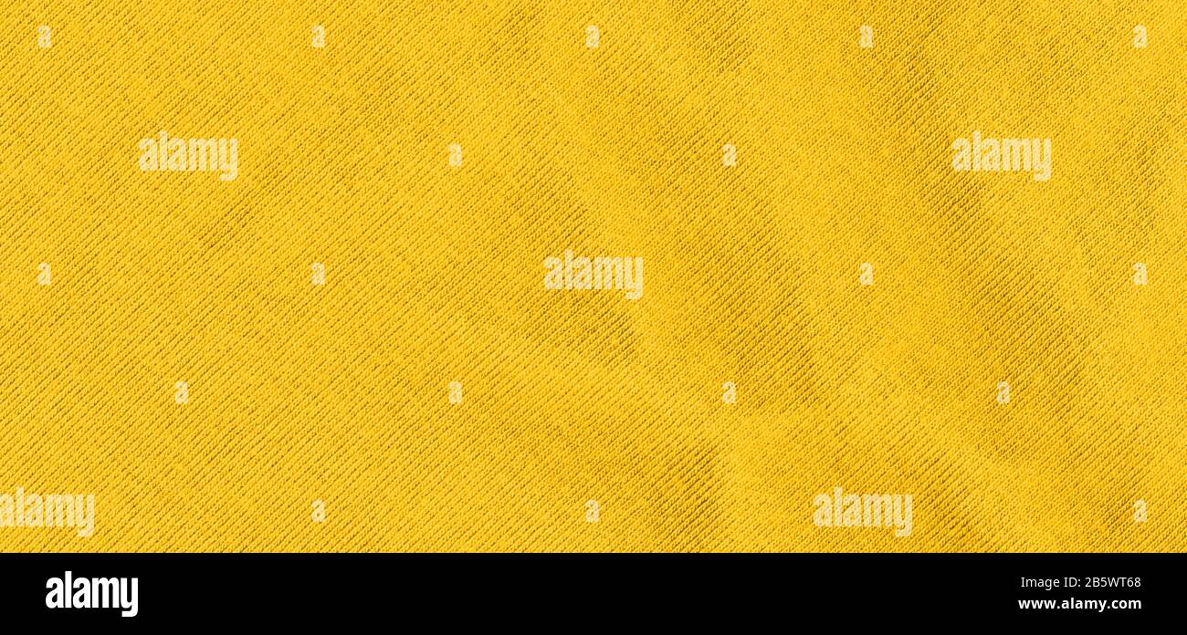 Vibrant yellow texture of binding fabric. Yellow textile background ...