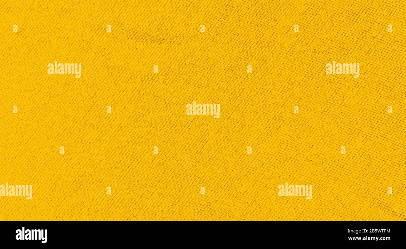 Vibrant yellow texture of binding fabric. Yellow textile background ...