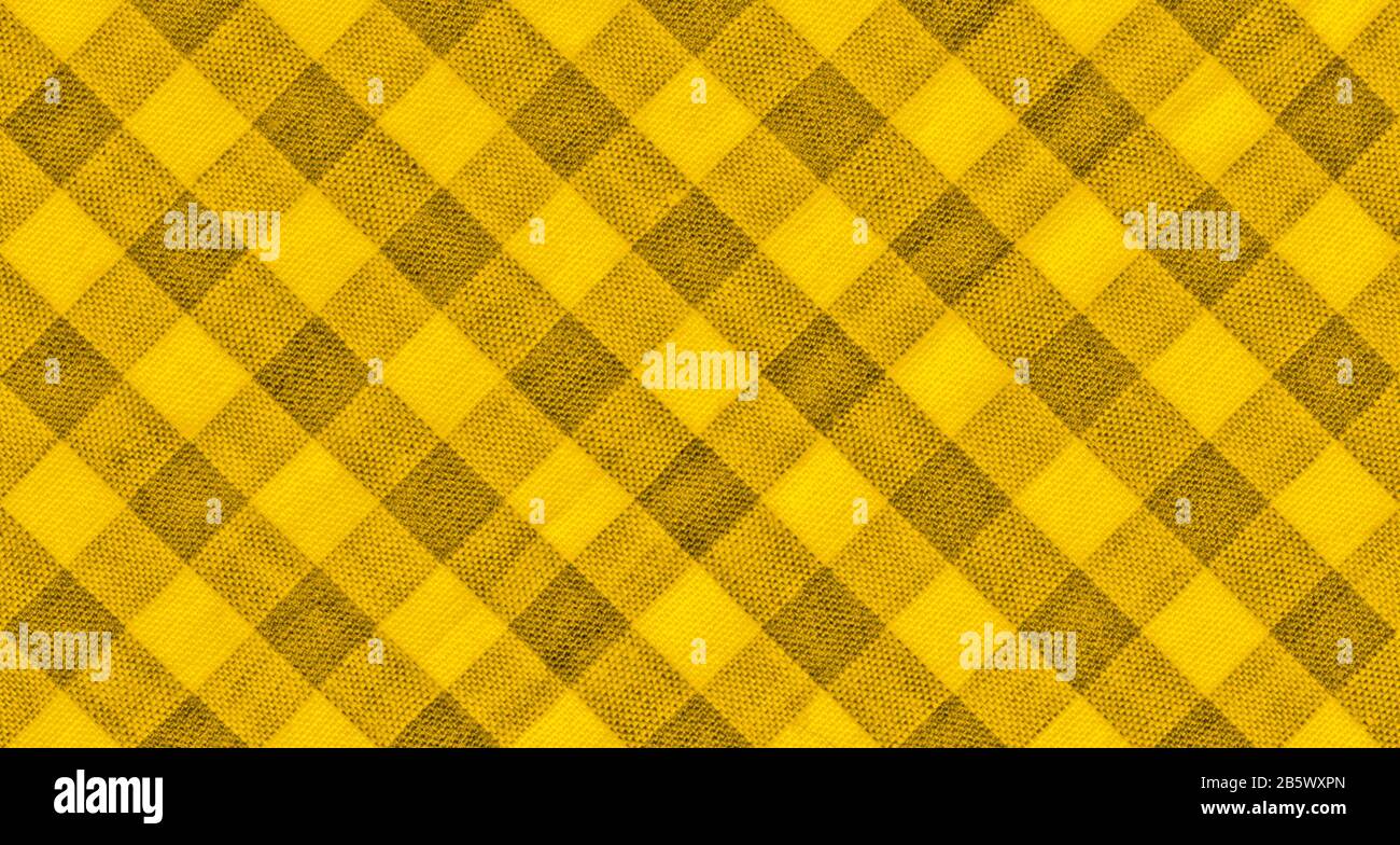 The texture of the bright yellow of binding gingham fabric. Yellow ...
