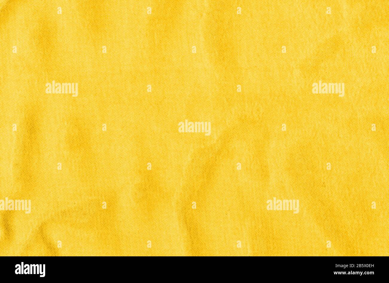 Vibrant yellow texture of binding fabric. Yellow textile background ...