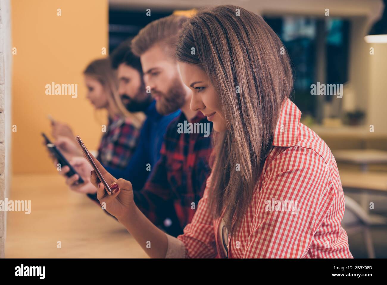 Group students typing messages hi-res stock photography and images - Alamy