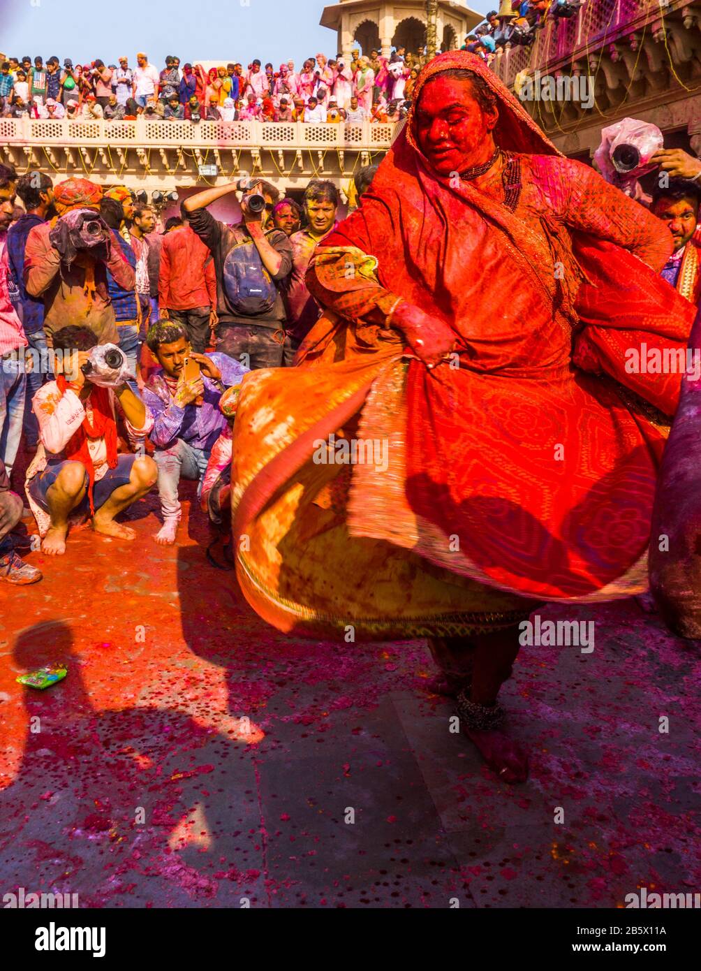 transgender holi in Mathura holi festival. People dancing and playing ...