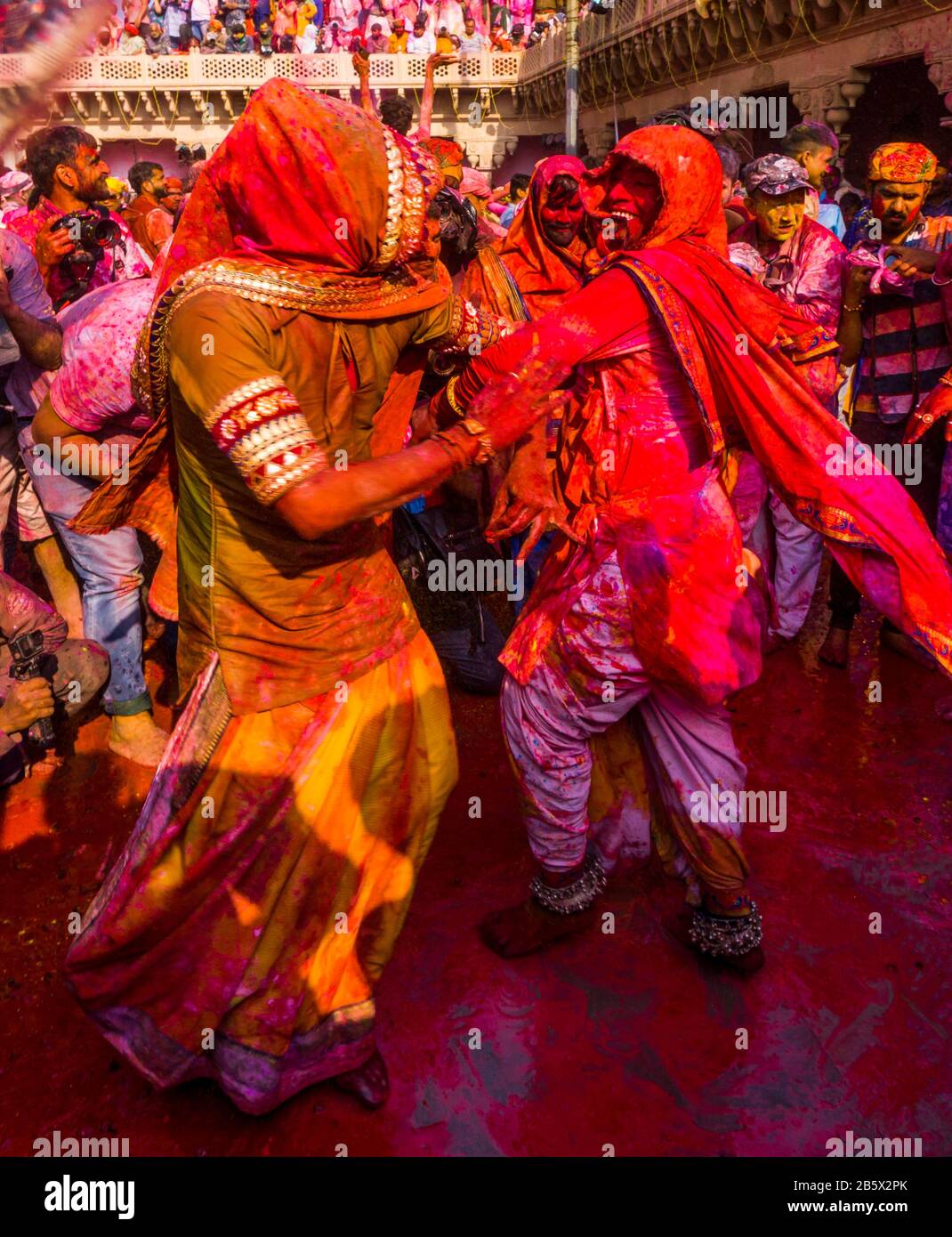 transgender holi in Mathura holi festival. People dancing and playing ...