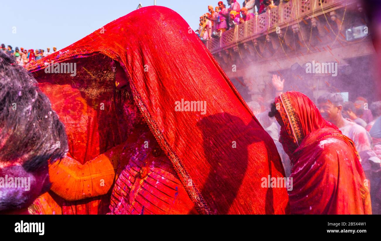 transgender holi in Mathura holi festival. People dancing and playing ...