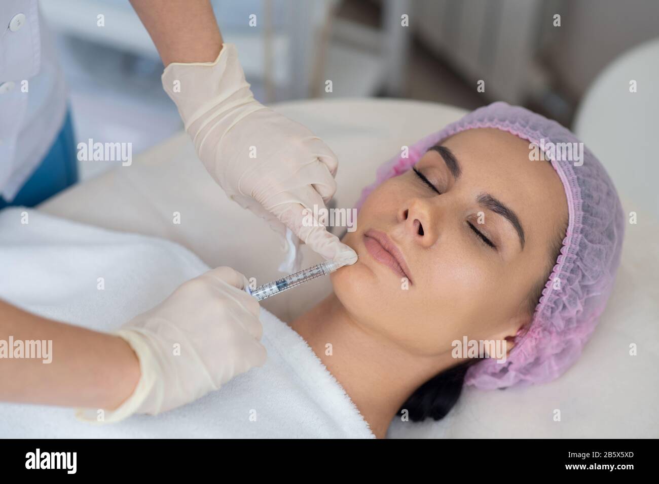 Woman having beauty injections hi-res stock photography and images - Alamy