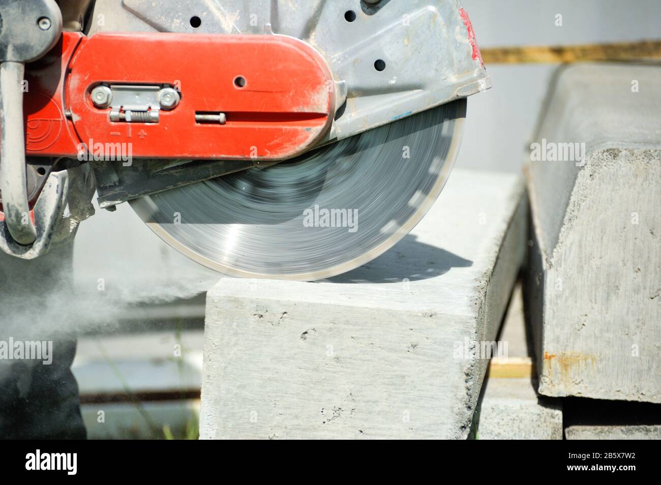 The joint cutter machine on a brushed concrete surface. Construction ...