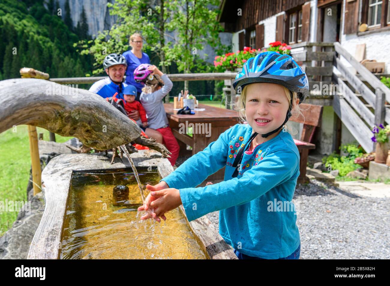 Water trough children hi-res stock photography and images - Alamy