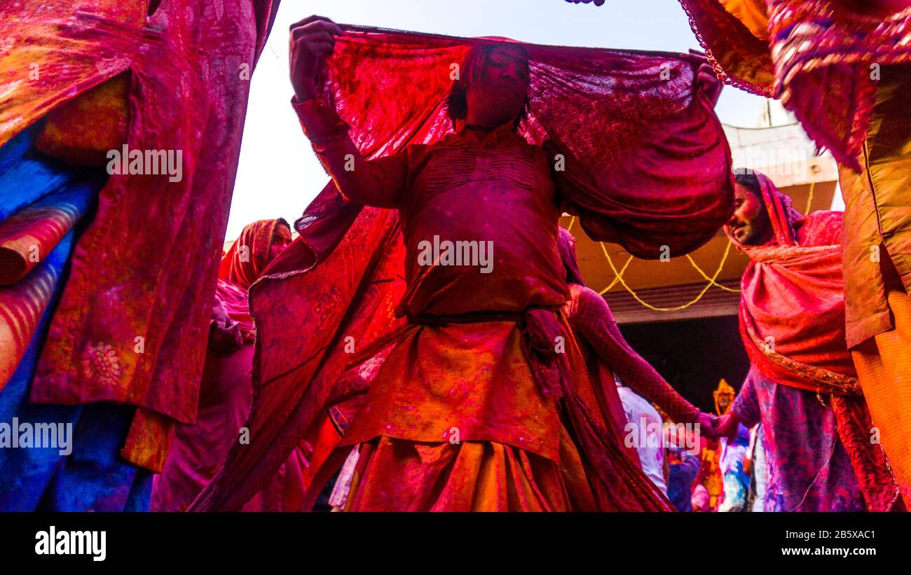 transgender holi in Mathura holi festival. People dancing and playing ...