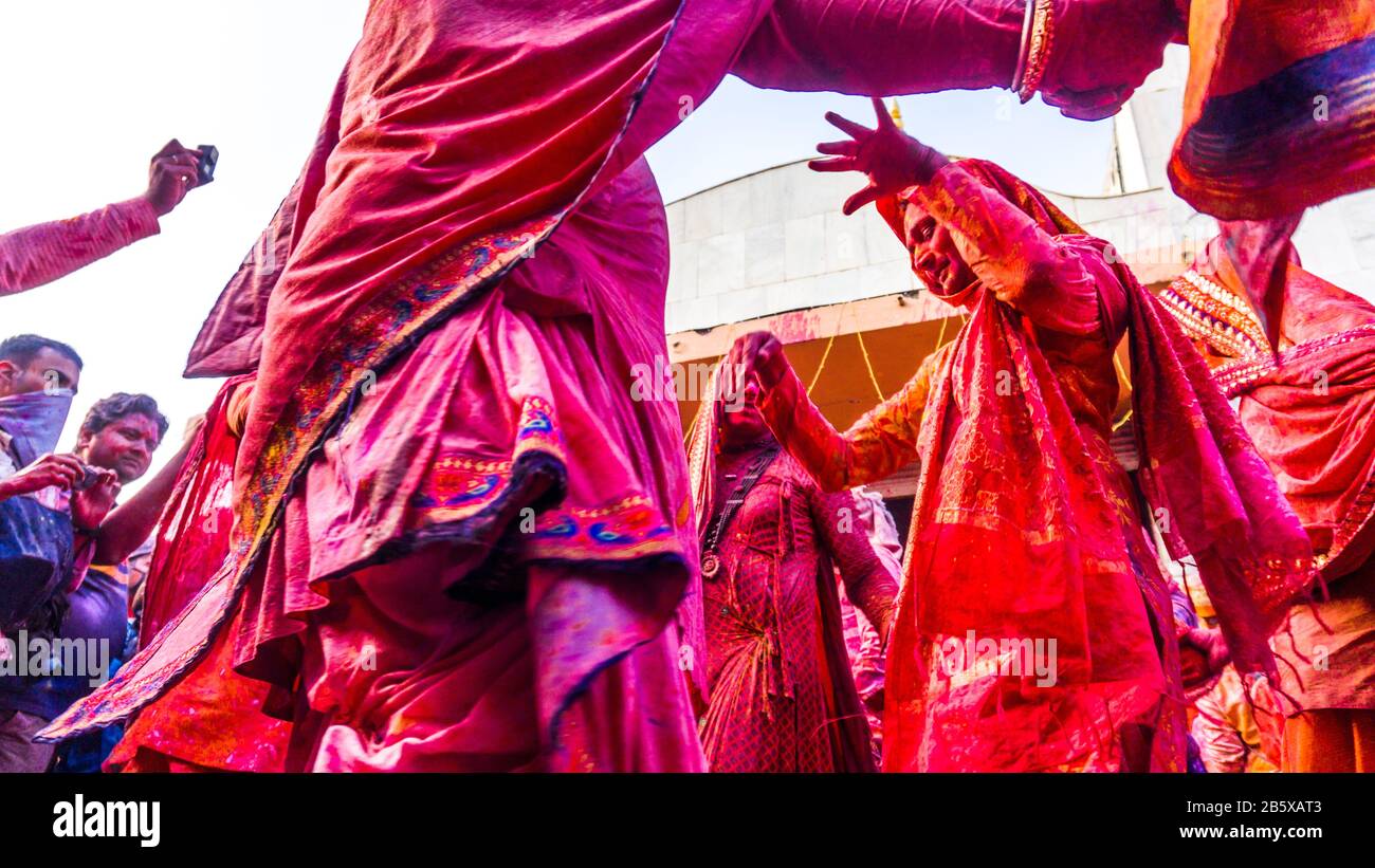 transgender holi in Mathura holi festival. People dancing and playing ...